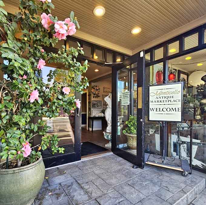 Pink blooms frame the doorway like nature's way of saying "trust us, you'll want to go inside."