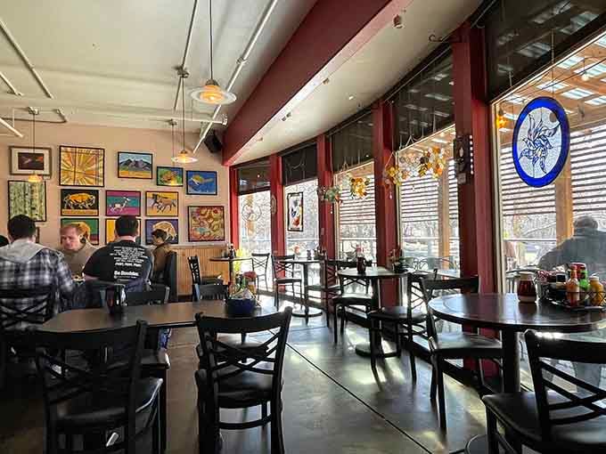 Local art adorns the walls while natural light floods the space, creating an atmosphere that's both energizing and relaxed.