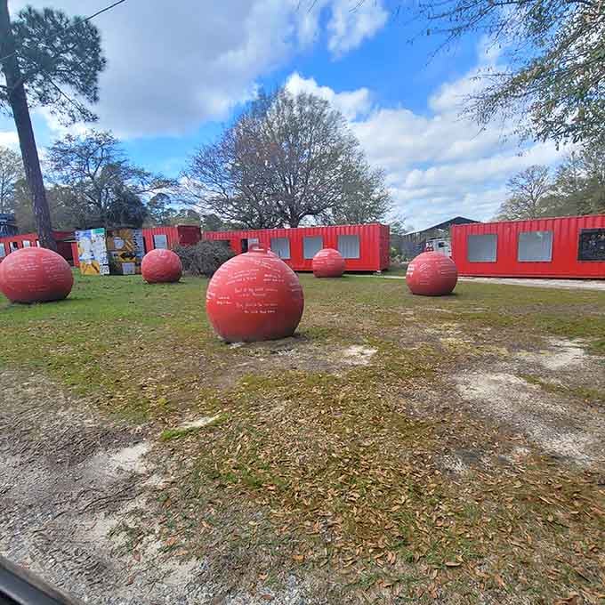 Giant red spheres dot the landscape like oversized Christmas ornaments that escaped from a particularly creative giant's holiday display.