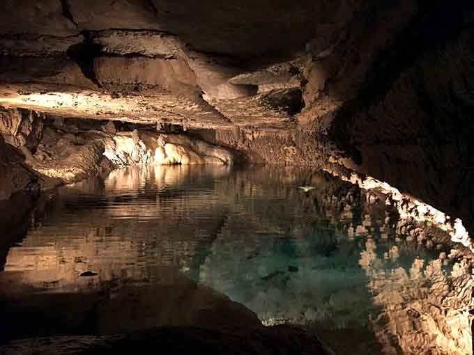 This underground pool looks like something from a fantasy novel, complete with crystal-clear water and otherworldly reflections.