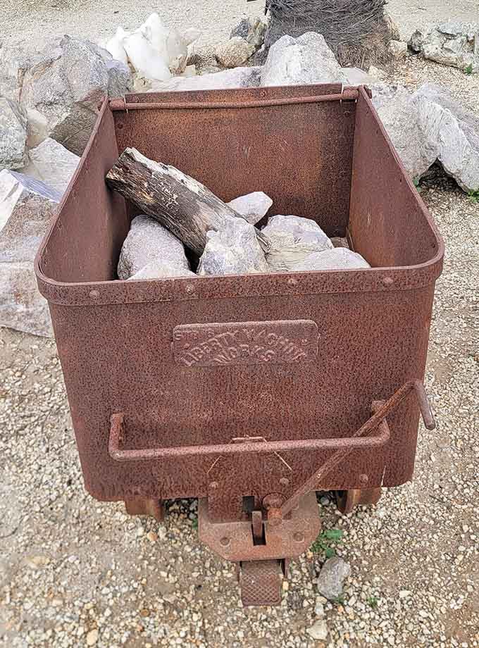 This weathered ore cart has hauled more dreams than rocks, a rustic workhorse ready for your gemstone adventure.