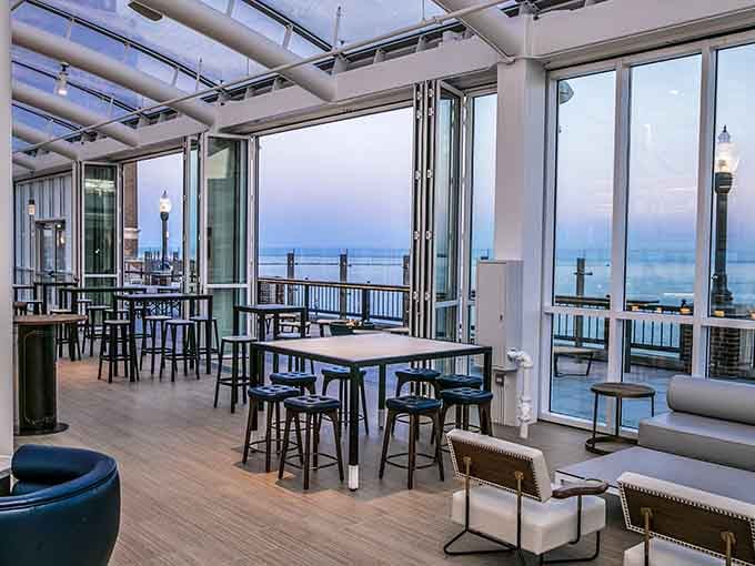 Floor-to-ceiling windows frame Lake Michigan like the world's most expensive painting, except the view comes with dinner.