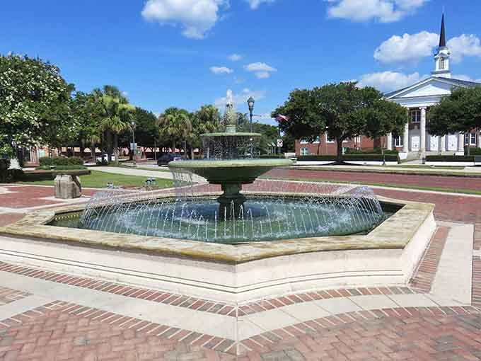 This fountain anchors a town square where community still means something beyond your social media followers.