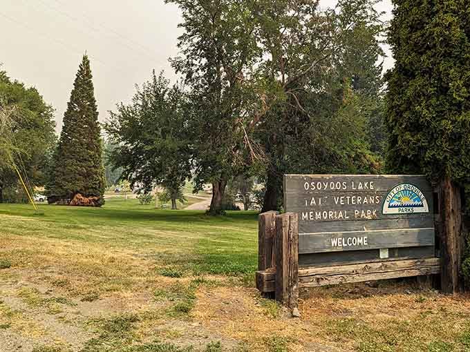 The welcome sign at Osoyoos Lake Veterans Memorial Park doesn't oversell anything, which is refreshingly honest for a place this beautiful.