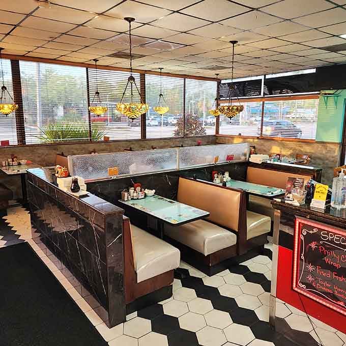 Retro booths and hexagonal tile floors create the perfect setting for lingering over coffee and conversation.