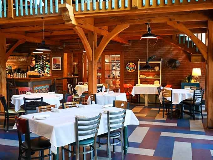 Exposed brick meets warm wood beams in a space that feels more Cape Cod than Midwest magic.