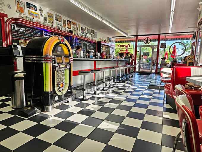 Black and white checkered floors meet chrome perfection in this time capsule where Elvis would feel right at home.