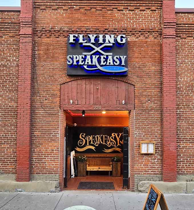 The Flying X Speakeasy entrance promises the kind of atmosphere where Prohibition-era secrets still linger deliciously.