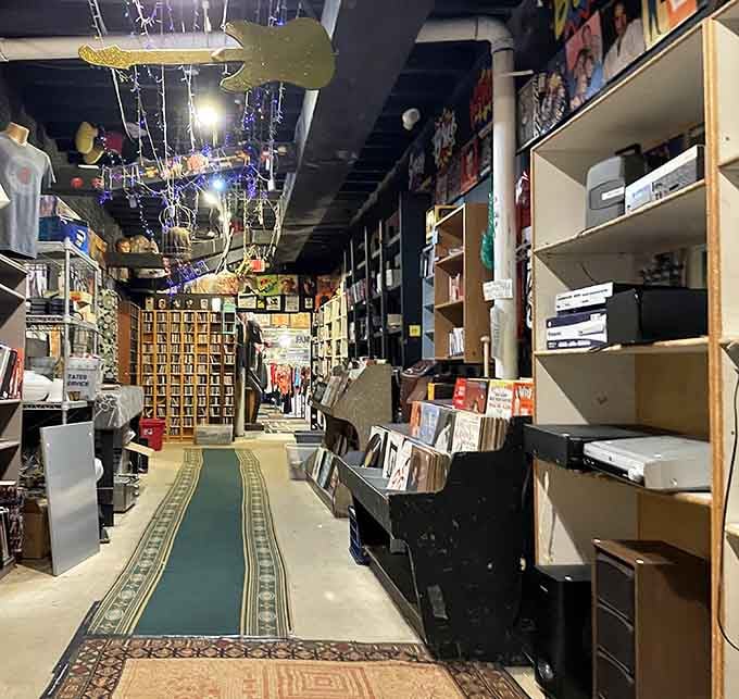 This isn't just a hallway, it's a portal to possibility lined with records, books, and delightfully random discoveries.