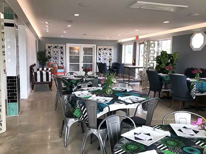 Modern coastal elegance with bold patterns and fresh flowers, because dining rooms should spark joy too.