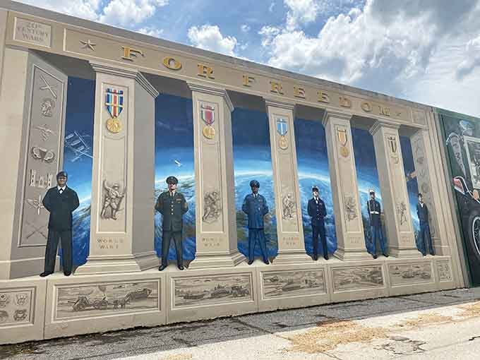 Standing at attention, these service members remind us that freedom isn't free, even painted on concrete.