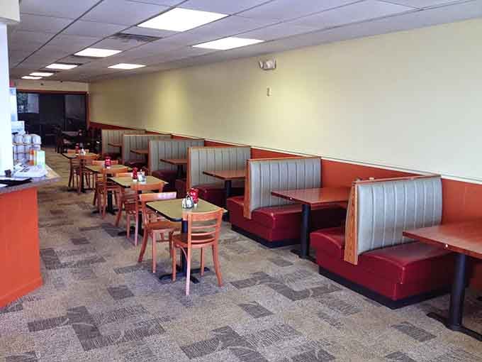 Classic red booths and clean lines prove that sometimes the best restaurants don't need fancy decor.