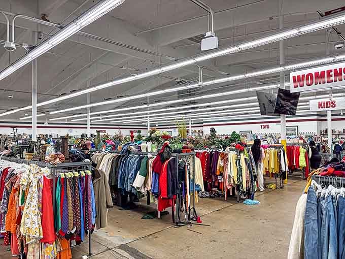Endless aisles stretch like a rainbow highway of second chances, each rack holding someone's yesterday and your tomorrow.