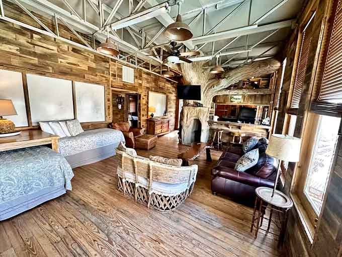 That ceiling alone deserves its own architectural award, and those leather chairs are begging for afternoon naps.