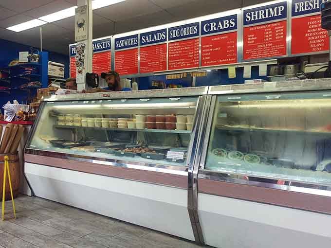 Clean display cases and overhead menus tell you everything you need to know: this place means business about seafood.