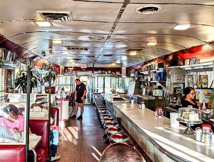 Classic diner counter seating where the coffee's always hot and the conversation flows as freely as the syrup.