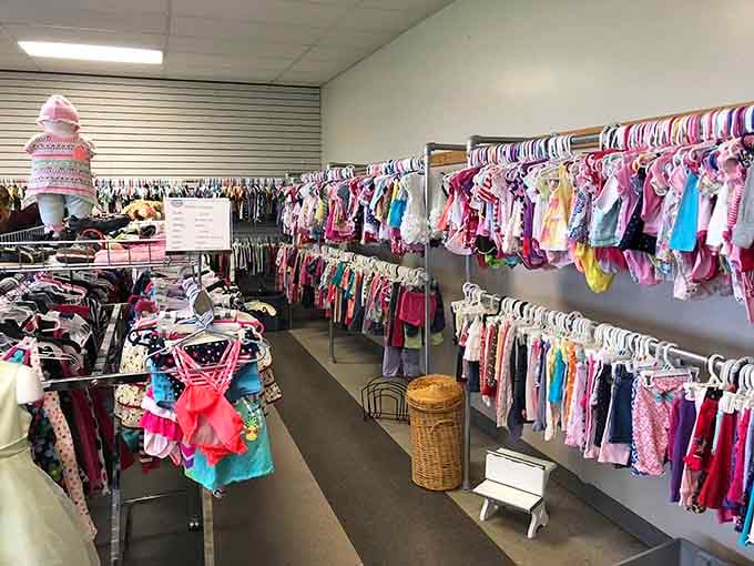 Rows of tiny outfits organized by color create a rainbow that'll make any grandparent's heart skip a beat.
