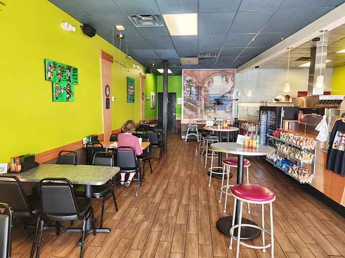 Bright walls and simple seating mean business: they're here for the food, not fancy furniture.