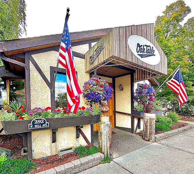 The Oak Table Cafe's charming exterior promises the kind of breakfast that justifies elastic waistbands.