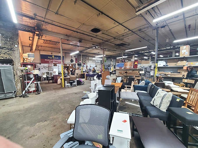 The sprawling interior reveals organized chaos at its finest, where furniture meets function at friendship prices.