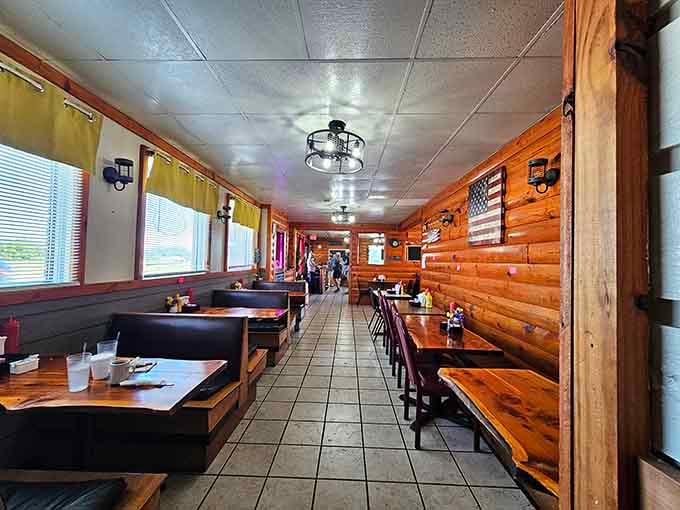 Step inside and discover where rustic charm meets serious comfort food, complete with wood-paneled walls and cozy booths.