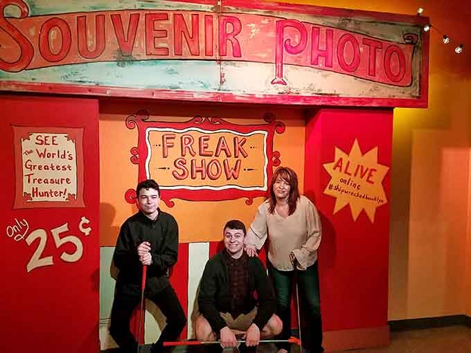The vintage carnival photo booth setup proves that some traditions never go out of style, especially at twenty-five cents.