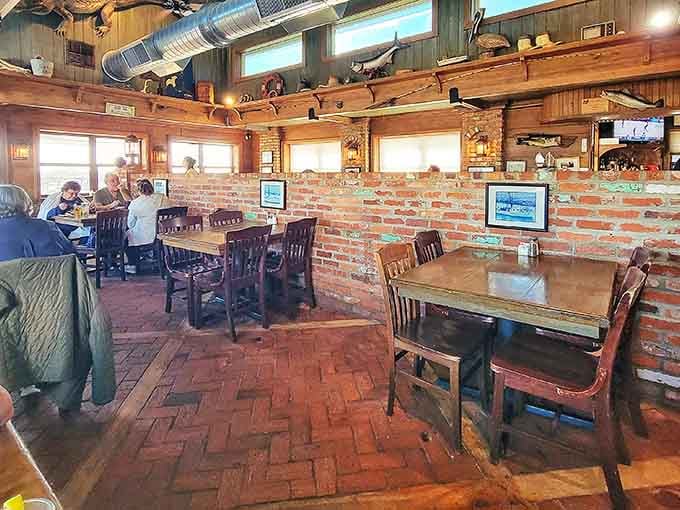 Brick floors and wooden walls create the kind of authentic atmosphere that fancy restaurants spend fortunes trying to replicate.