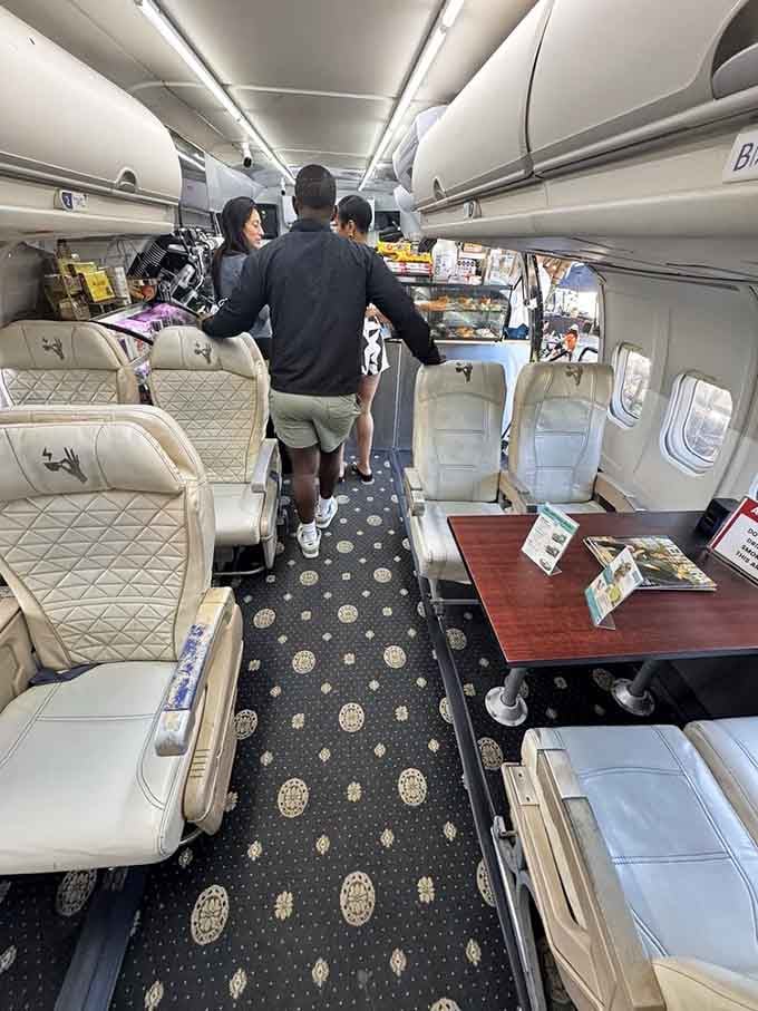 Inside, the overhead bins stay closed while the coffee flows, proving retirement can be absolutely magnificent.