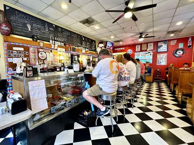 Chrome stools and checkered floors create the perfect setting for your next delicious decision at the counter.