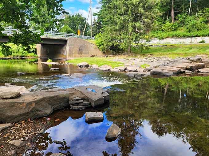 The rocky creek bed becomes nature's own stepping stone course, perfect for adventurous kids and nostalgic adults alike.