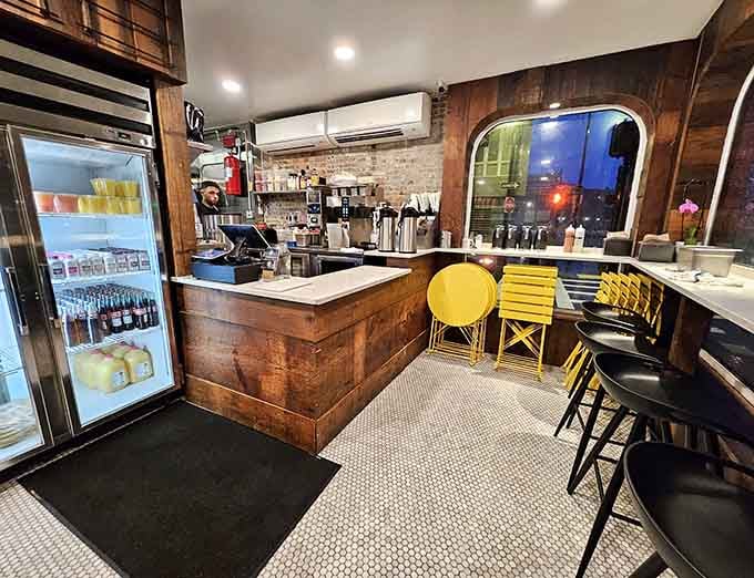 Exposed brick, warm wood, and that counter where breakfast dreams become delicious reality—this is morning done right.