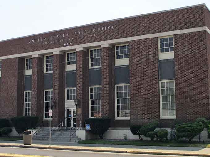The historic post office building stands proud in brick, a reminder that some things were built to last beyond next quarter's earnings.