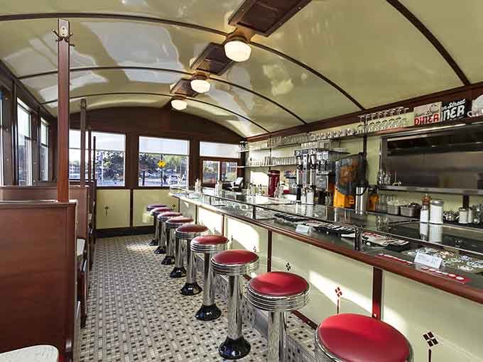 Chrome stools, vintage counter, and that classic curved ceiling create the perfect setting for your pancake pilgrimage.