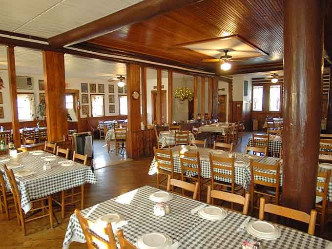 Checkered tablecloths and warm wood everywhere: your grandmother's dining room if she could seat the whole neighborhood.
