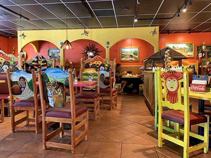 Hand-painted chairs and vibrant murals create a fiesta for your eyes before the food even arrives.