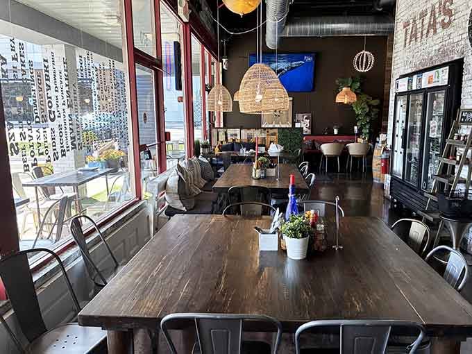 Modern meets cozy inside, where woven pendant lights and communal tables create the perfect pierogi-eating atmosphere.