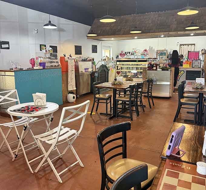 Inside, mismatched furniture creates the kind of welcoming chaos that makes you want to stay all afternoon long.