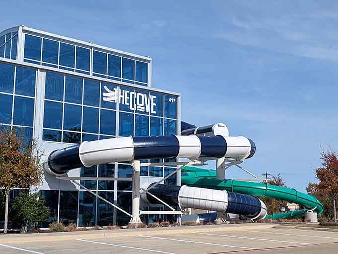 Those external slides spiraling down the building's exterior are basically architectural bragging rights in waterpark form.