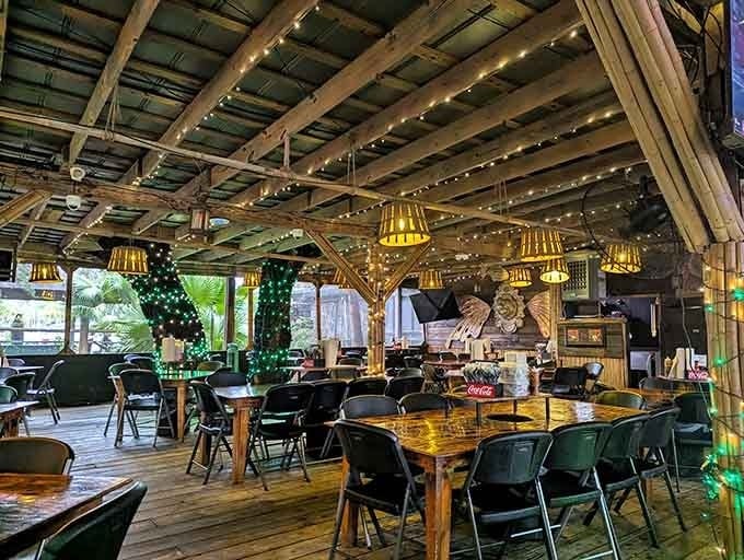 String lights and picnic tables under a tin roof: proof that ambiance doesn't need a designer.