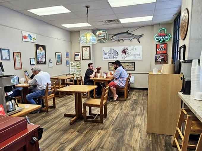 Inside, it's all about comfort and community, where fish-themed decor meets wooden tables ready for serious eating sessions.