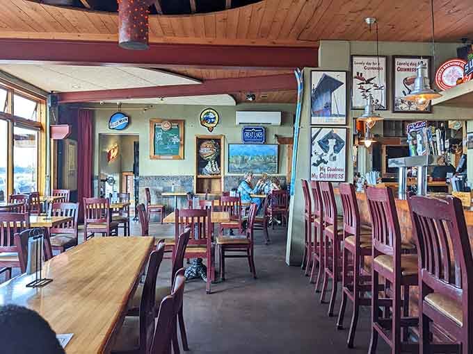 Inside, vintage signs and local character create the kind of atmosphere where strangers become friends over shared plates and good conversation.