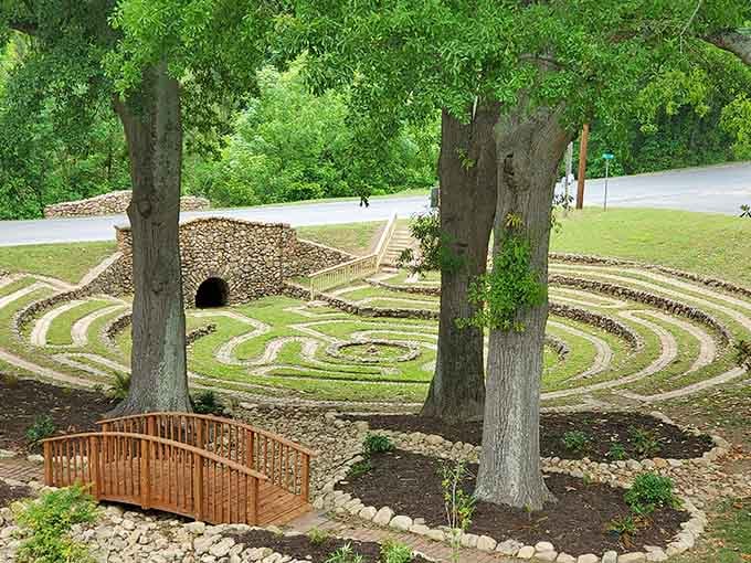 Stone borders and manicured grass create a walking meditation that costs exactly zero dollars to experience.