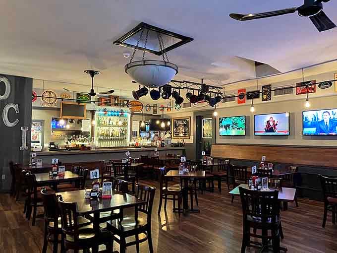 The coffin chandelier hanging from the ceiling proves that death-themed d&eacute;cor and sports bars can absolutely coexist in perfect harmony.