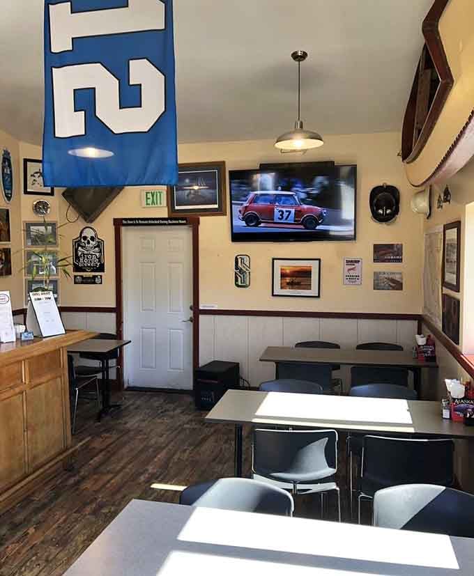 Sports memorabilia meets nautical charm in a space that feels like your coolest friend's rec room.