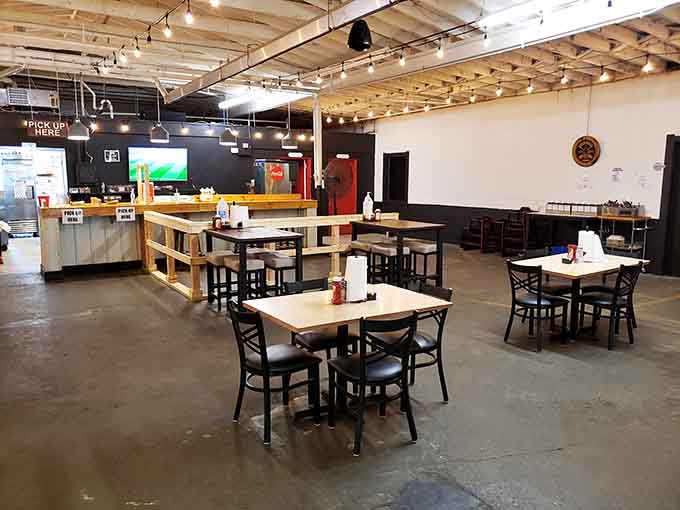 Industrial chic meets barbecue comfort in a space that knows exactly what it's here to do.