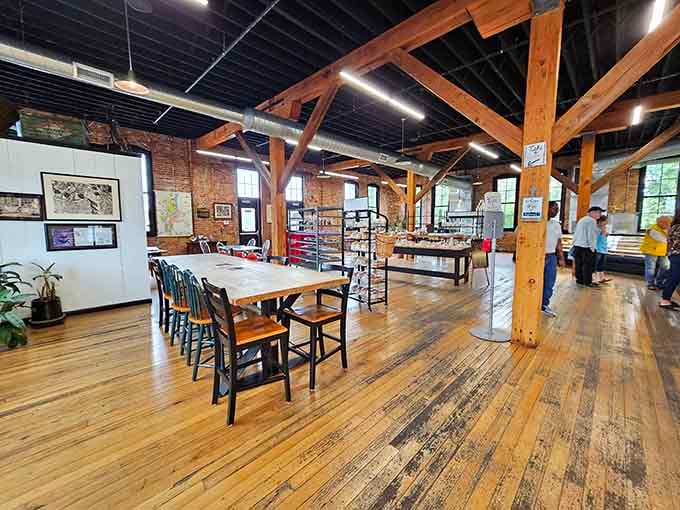 Exposed beams and hardwood floors create a space where you'll want to linger over pastries like a civilized human.