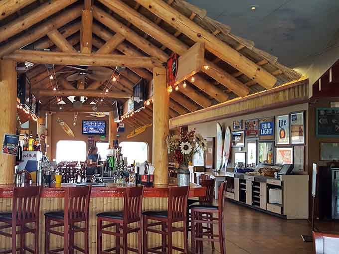 Exposed beams and surfboard decor create that authentic island atmosphere you've been craving all winter long.