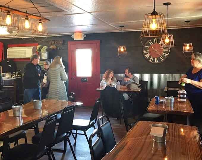 Industrial chic meets small-town charm in a dining room where the lighting is as warm as the welcome.