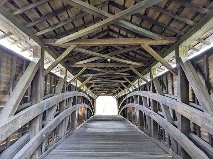Step inside and marvel at the hand-hewn beams that make modern construction look like a participation trophy.