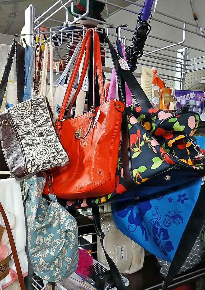 A kaleidoscope of purses hanging like fashion's greatest hits album, waiting for their comeback tour.